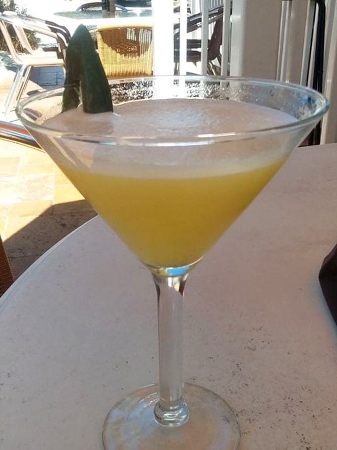 This cucumber martini isn't just refreshing—it's what sophisticated mermaids would sip if they decided to come ashore for happy hour.