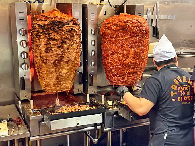 Trompo heaven—vertical spits of marinated meat slowly rotating, promising al pastor tacos that might make you temporarily forget your name.
