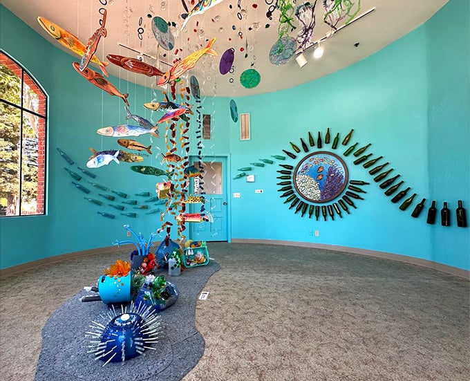 An underwater fantasy in turquoise – this installation transforms ordinary space into an extraordinary marine ecosystem of color and movement.