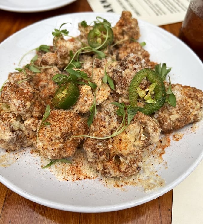 Cauliflower transformed from boring side dish to main event star, with spices that make each bite a tiny flavor explosion.