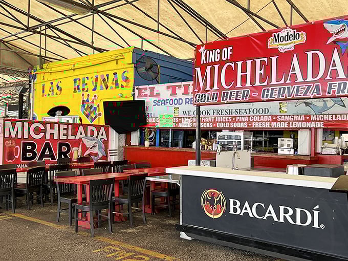 The "King of Michelada" beckons thirsty shoppers with promises of spicy beer concoctions—the perfect reward after hours of haggling.