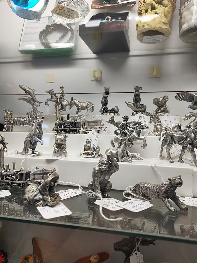 Tiny silver worlds captured in pewter. Each miniature figurine tells a story—from galloping horses to proud bears standing sentinel over your curio cabinet.