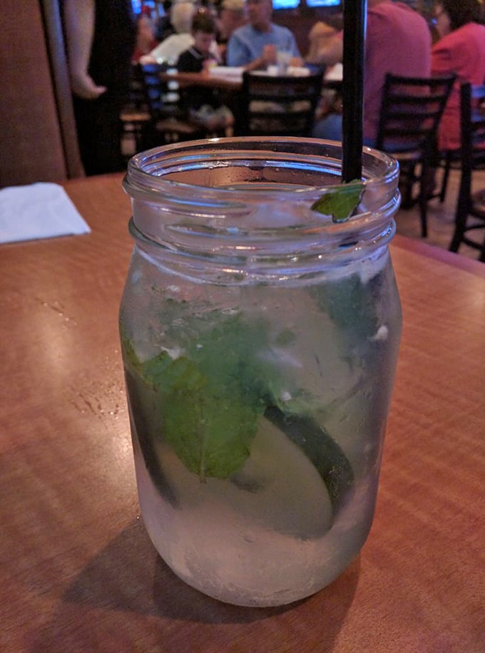 A mason jar mojito that's more garden than glass – fresh mint and lime creating the kind of refreshment that makes you sigh with contentment.