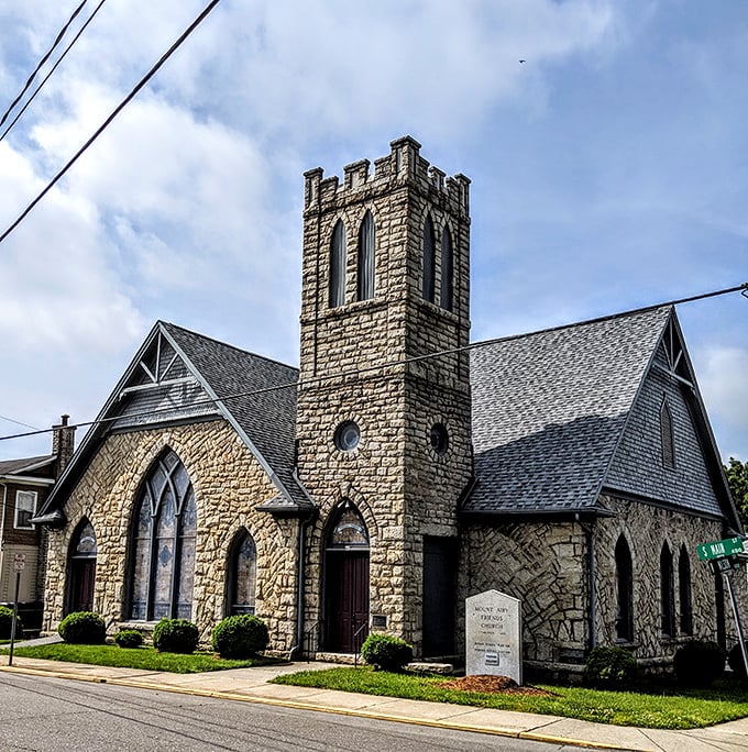 Mount Airy Friends Church blends stone craftsmanship with spiritual sanctuary in perfect architectural harmony.