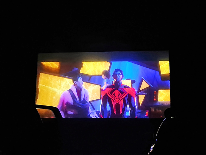 Spider-Man swings larger than life across the massive screen - superheroes just feel more super when they're three stories tall.