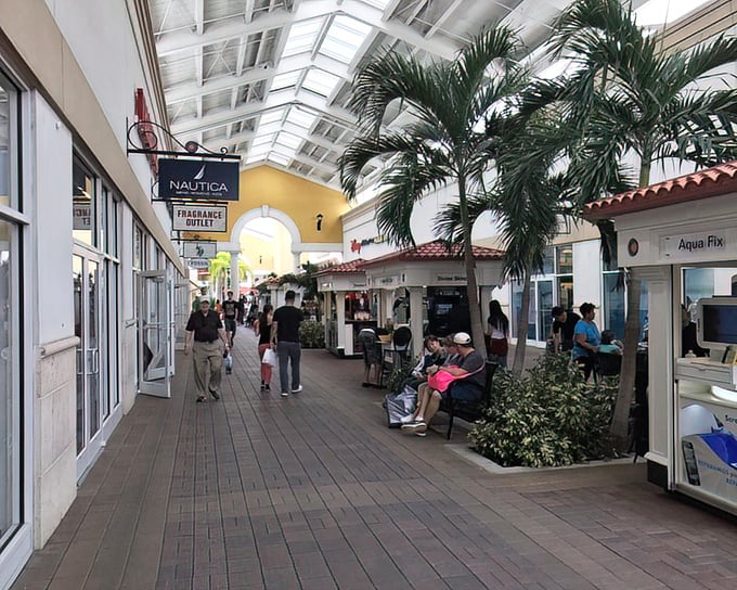 Indoor palm trees and skylit ceilings create the perfect Florida shopping illusion: "You're outdoors!" (But with merciful air conditioning).