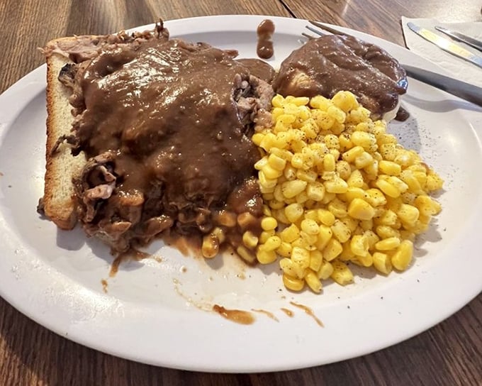 Open-faced roast beef that doesn't hide behind pretense—just honest meat, honest gravy, and corn that tastes like summer memories.