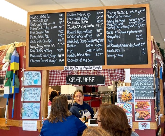 The ordering counter—where dreams become reality and decisions become delicious. Ask for a chowder sample; you'll thank me later.