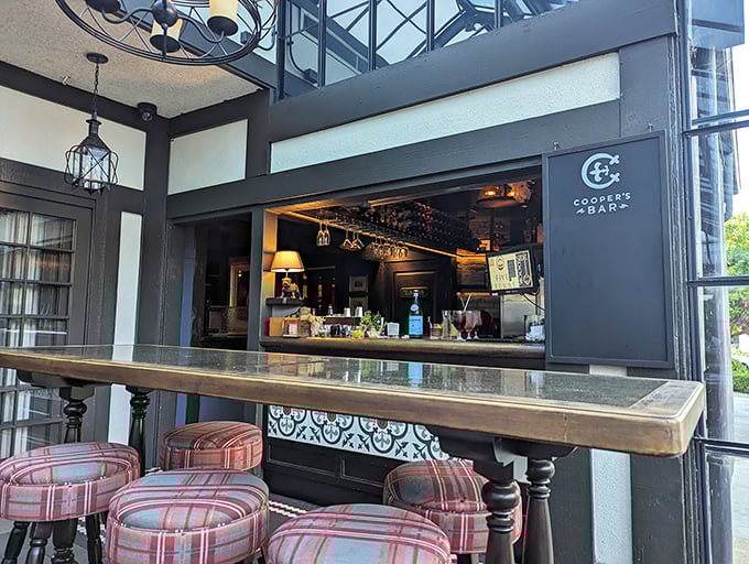 Cooper's Bar offers a more casual vibe with the same attention to detail—those plaid stools have supported some serious food appreciation.