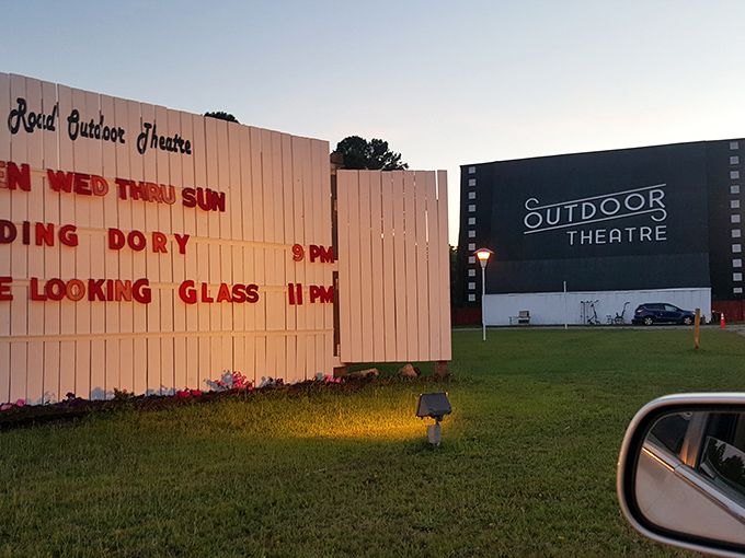 The roadside marquee announces tonight's double feature—a bargain that streaming services can't match in atmosphere or nostalgia value.