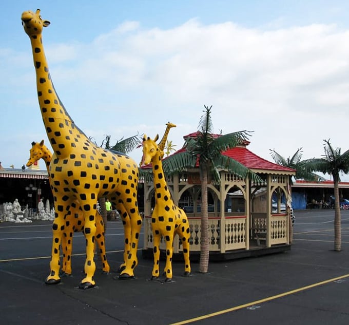 Life-sized giraffe statues and a gazebo—because nothing says "I had a successful shopping trip" like bringing home a 15-foot safari souvenir.