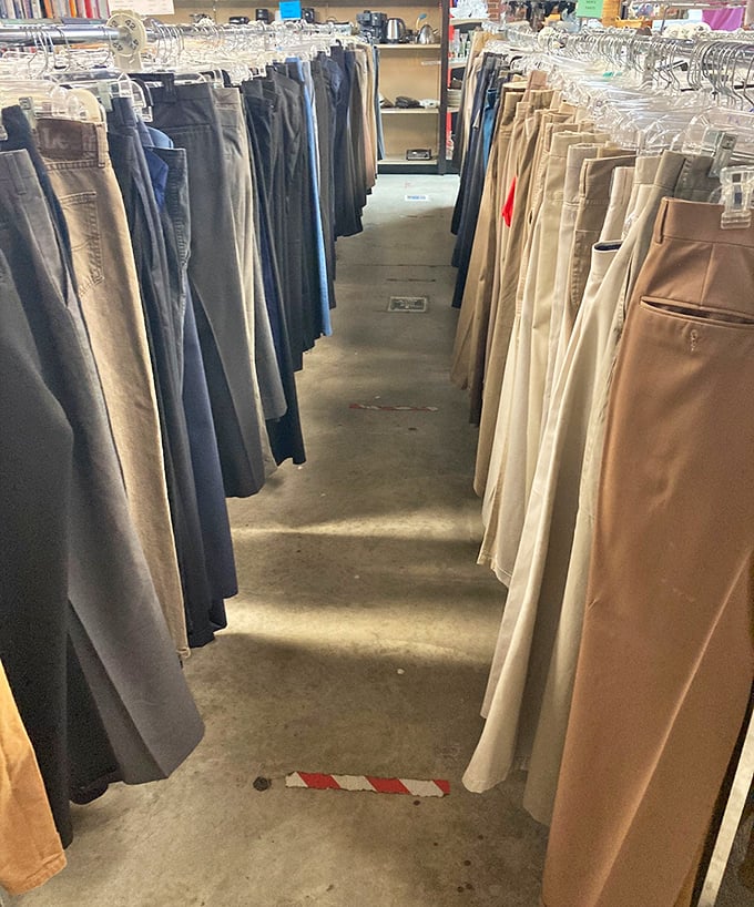 The pants aisle—a perfectly organized canyon of khaki and denim. Like browsing a library where every book is your size.