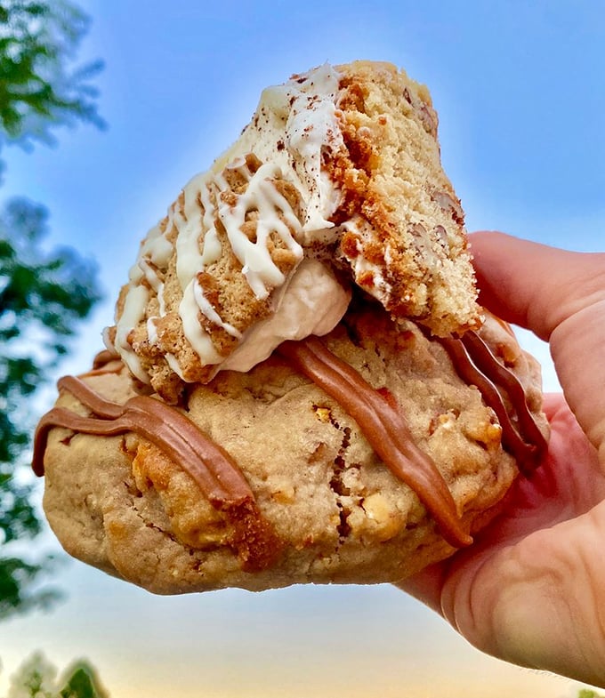 This isn't just a cookie—it's an engineering marvel of layers, with caramel drizzle creating edible abstract art worthy of a museum display.