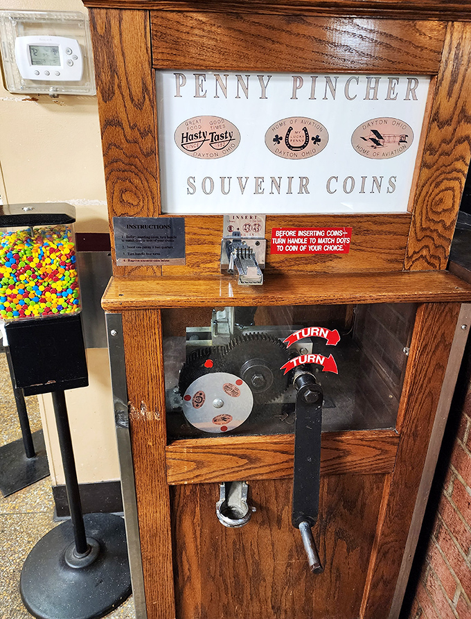 The penny pincher machine—a charming relic from when entertainment cost pennies and created memories worth millions. Kids still light up at the mechanical magic.