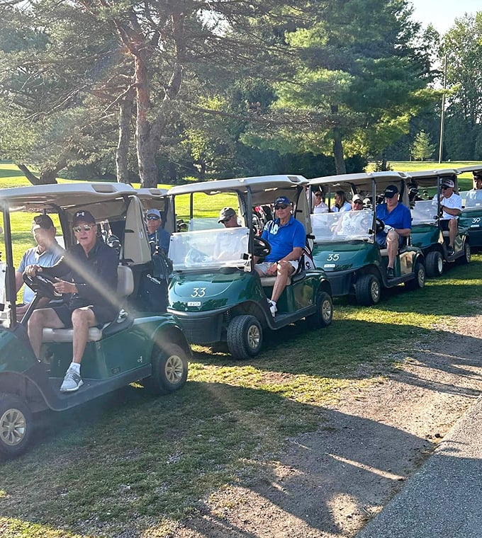 Golf carts line up like eager horses at the starting gate—a common sight at the community's regular tournaments and friendly competitions.