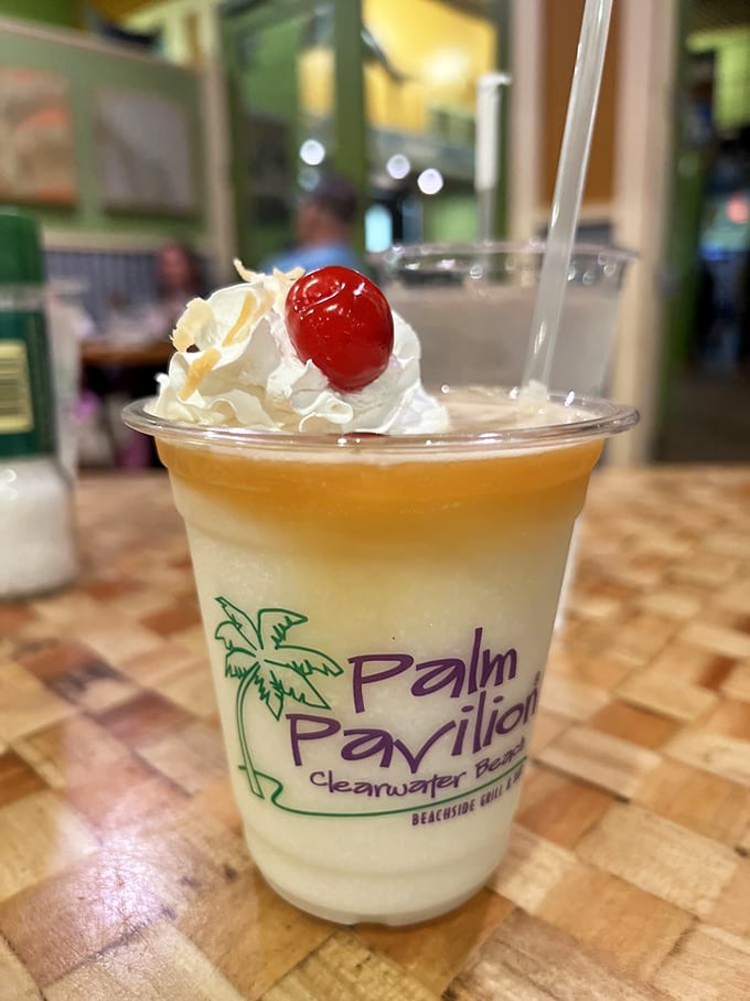 Vacation in a glass! Their signature Piña Colada arrives crowned with whipped cream and a cherry—liquid sunshine with a tropical twist.