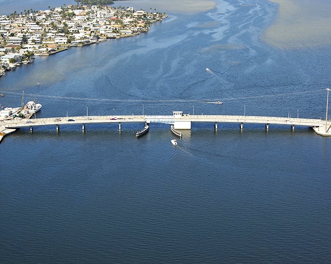 The Pine Island Bridge isn't just infrastructure – it's the gateway between mainland hustle and island time, a literal crossing into relaxation.