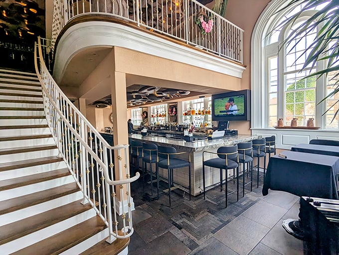 Elegant dining with a view! This sophisticated bar and staircase arrangement offers the perfect setting for retirement celebration toasts.