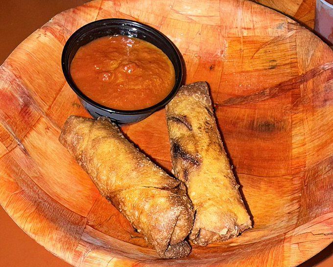 These golden-fried pizza rolls aren't just appetizers – they're the opening act for the main event, served with marinara for dunking.