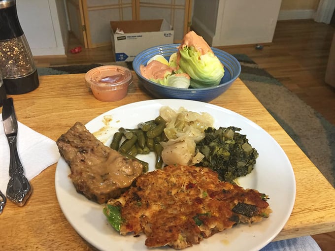 This plate doesn't just represent a meal—it's a colorful canvas showcasing the kitchen's versatility with vegetables and hearty Southern staples.