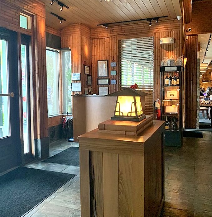 The entrance sets the tone: warm woods, soft lighting, and the promise of seafood excellence just steps away. First impressions matter.