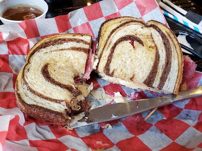 The Reuben on marble rye reveals its glorious layers like geological strata of deliciousness that would make any deli proud.