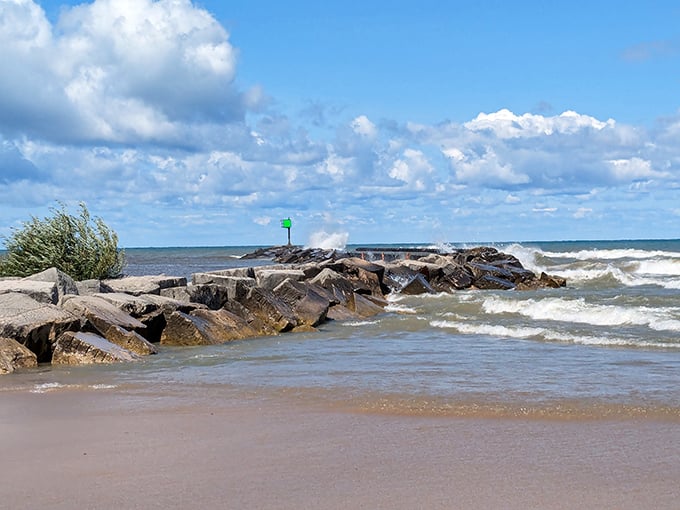 Where land and lake negotiate their boundaries daily, creating a symphony of splashing waves against ancient stones.