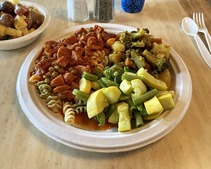 This isn't just a plate of pasta and vegetables—it's a colorful composition that proves vegetarian eating is anything but boring. The sauce looks like it means business.