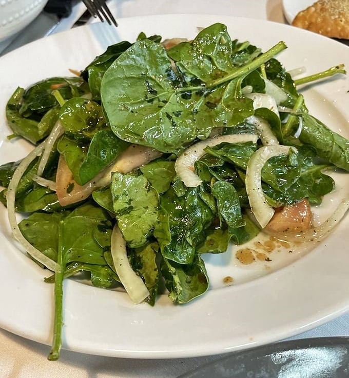 A simple spinach salad elevated to star status with the perfect dressing. Even Popeye would put down his can for this fresh alternative.