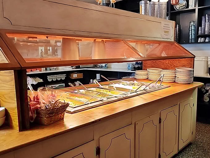 The buffet counter stands ready for action like a starting line for the most delicious marathon you'll ever run—pace yourself, there's pie at the finish.