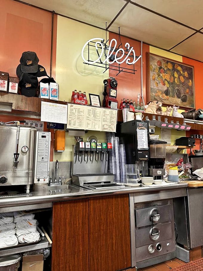 Behind that yellow counter, magic happens – coffee appears the moment your cup empties, as if the staff can read your caffeine-deprived mind.