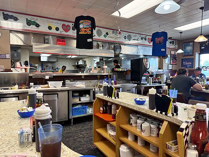 Behind the counter, breakfast magic happens with military precision—these kitchen veterans have the morning rush down to a science.