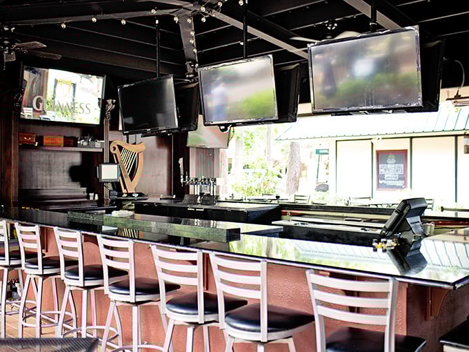 The outdoor bar area offers a different kind of island breeze—one scented with hops and the promise of good times.