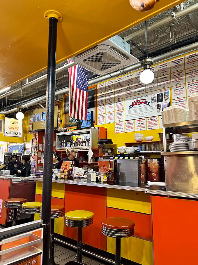 That American flag isn't just decoration—it's the focal point for the daily Pledge of Allegiance. Only in Annapolis could patriotism and pancakes coexist so naturally.