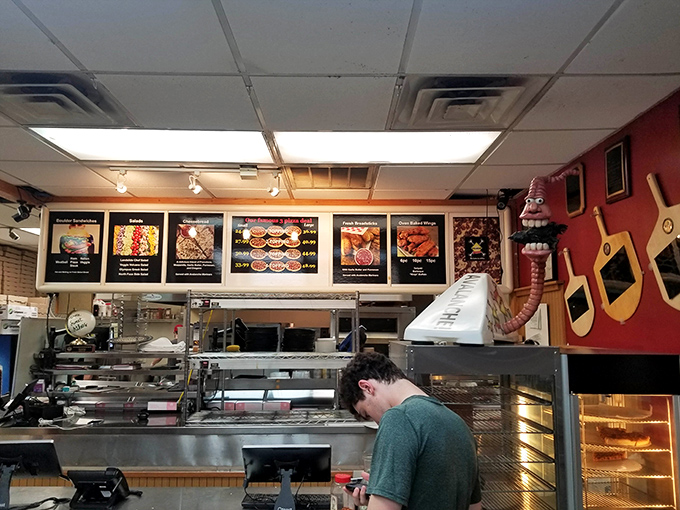 Where pizza dreams come true—the ordering counter where decisions are made and anticipation begins its delicious build.