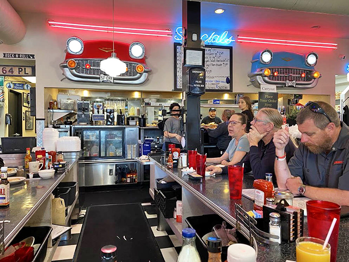 Counter culture at its finest—where strangers become neighbors and the staff remembers how you like your eggs without asking.