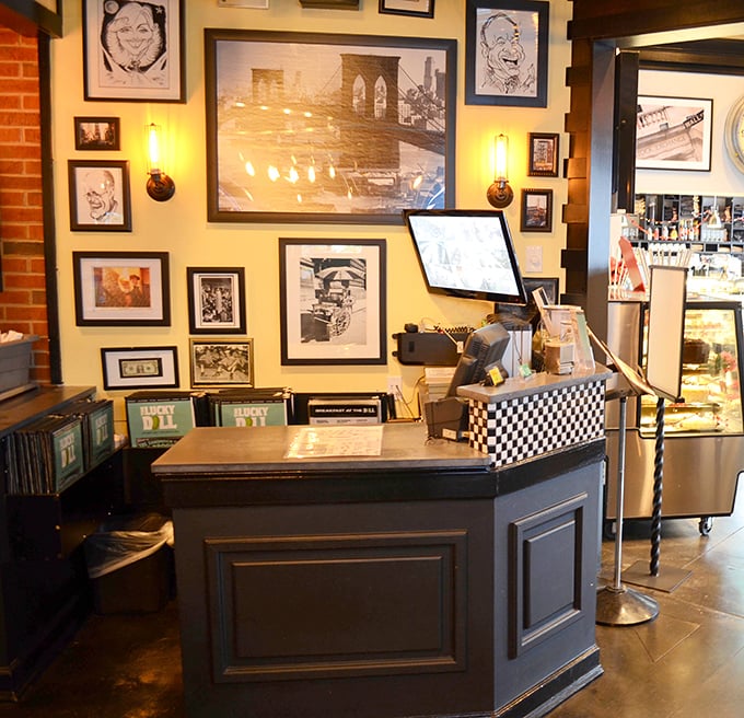 The host station showcases New York pride with Brooklyn Bridge artwork—your first clue this isn't just another Florida eatery.