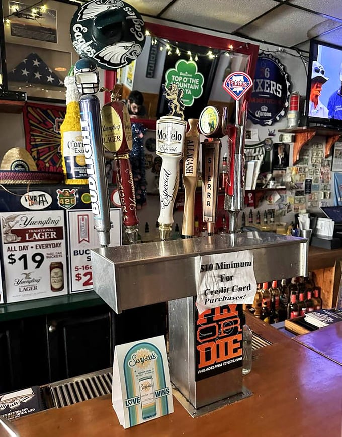 Beer taps standing at attention like soldiers guarding the promised land of perfectly poured pints and Philadelphia sports camaraderie.