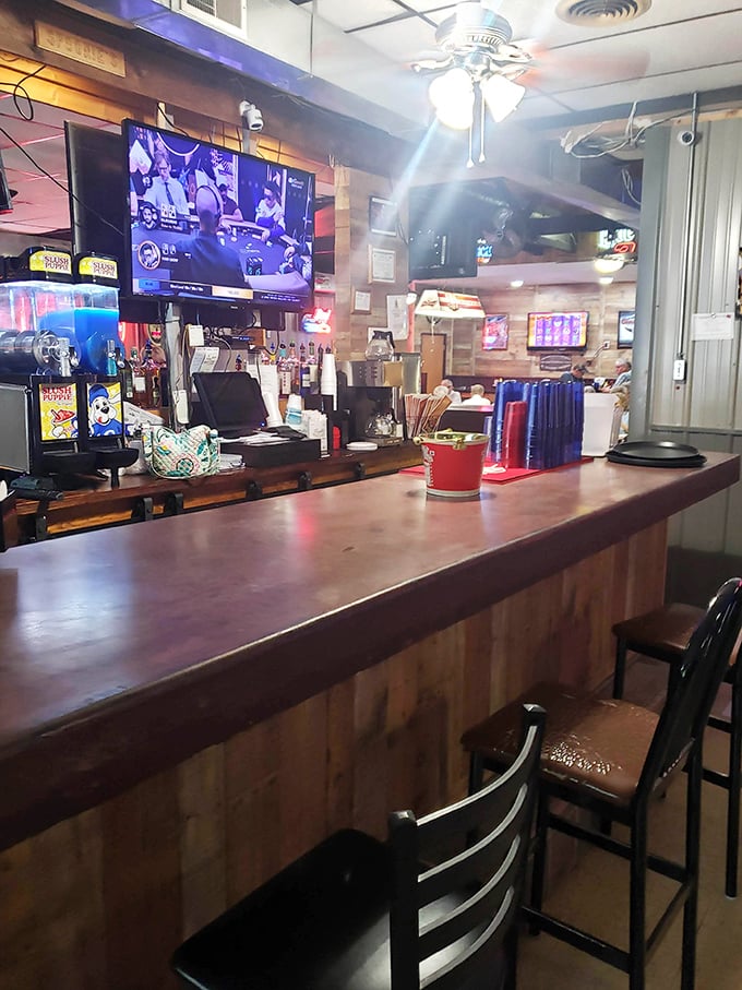 The service counter where magic happens—watch as orders disappear into the kitchen and emerge as plates of Midwestern culinary perfection.