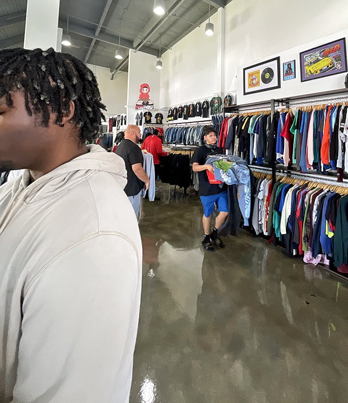 The thrill of the hunt in action – shoppers experiencing that unique joy that comes only from uncovering someone else's fashion castoffs.