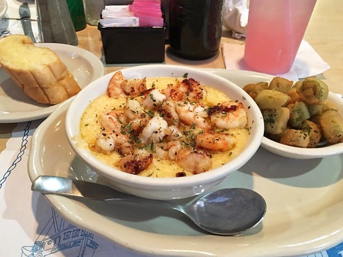 Shrimp and grits swimming in buttery goodness—a dish so satisfying it should come with a mandatory nap schedule.