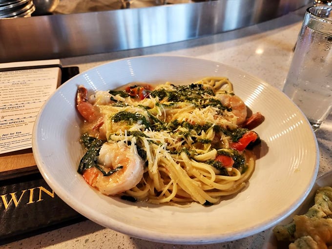 Shrimp scampi pasta where every twirl of your fork captures garlic-kissed noodles and plump shrimp—carb heaven with a seafood upgrade.