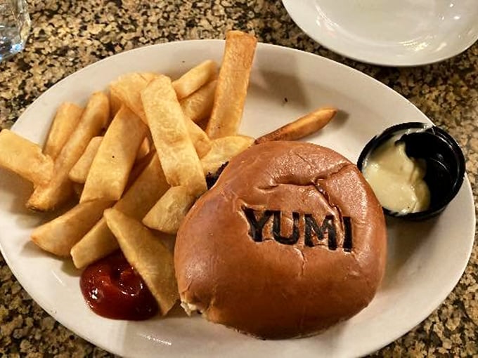 When your burger bun literally says "YUM," it's not being presumptuous—it's just stating facts. Truth in advertising at its finest.