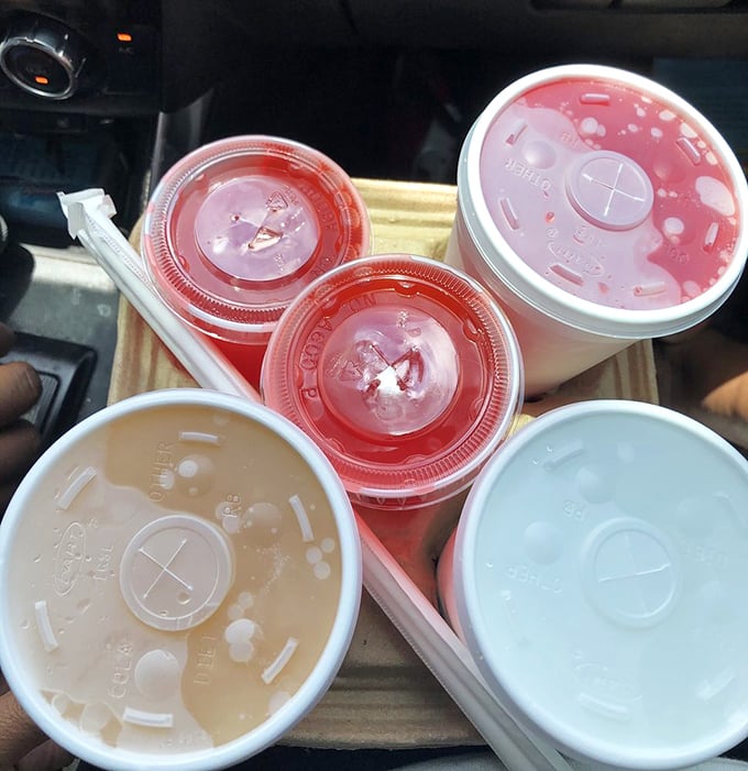 Rainbow of fountain drinks standing at attention, ready to extinguish the delicious fire from all that barbecue sauce.