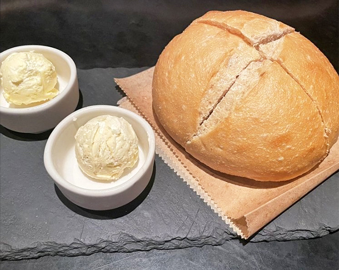 Fresh sourdough with whipped butter – the opening act that threatens to steal the show from the headlining steaks.