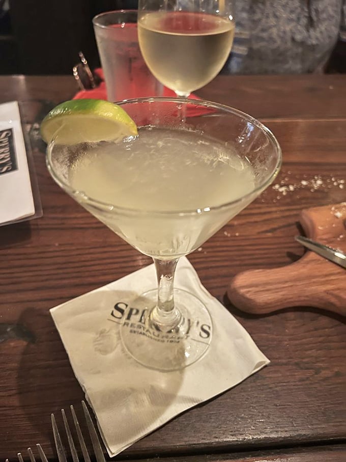 A classic martini served with proper glassware and a lime twist – the liquid equivalent of a perfectly tailored suit. Elegance in a glass. 