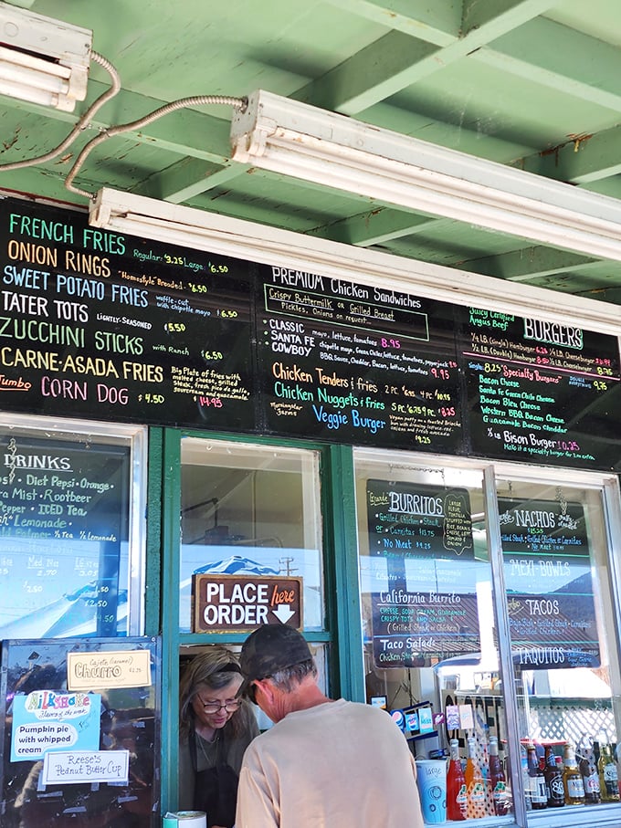 The ordering window—where dreams come true and diet plans go to die. Worth every delicious calorie.