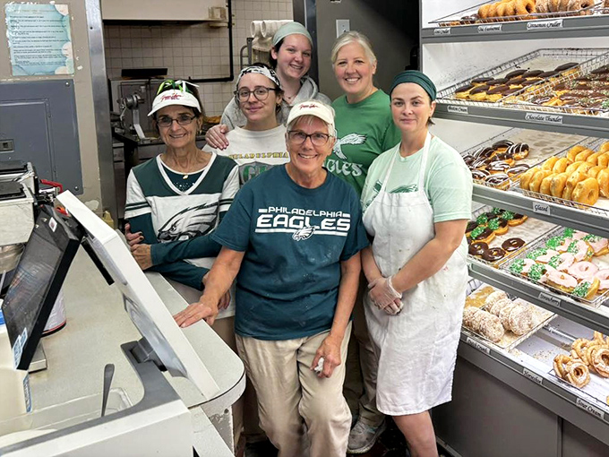 The team behind the magic – these Eagles fans know that championship-worthy donuts require teamwork, dedication, and a dash of Pennsylvania pride.