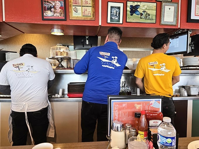 The kitchen crew – unsung heroes of breakfast bliss – orchestrating the morning symphony of sizzles and flips with practiced precision.