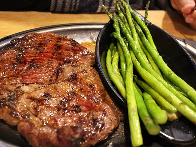 A steak and asparagus plate that's basically the Fred Astaire and Ginger Rogers of food pairings – classic, elegant, and perfectly matched.